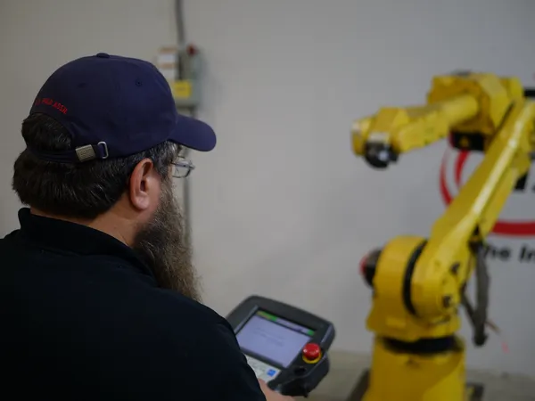 How Preventative Maintenance Reduces Robot Downtime | Robots.com